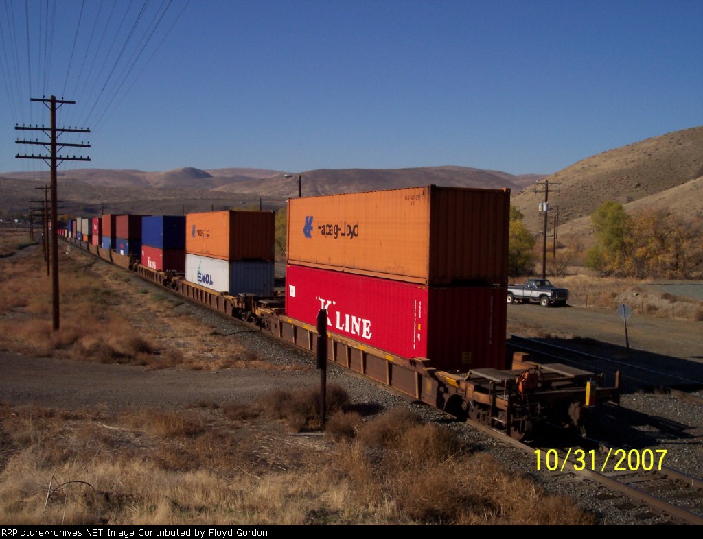 Union Pacific double stack train heads west
